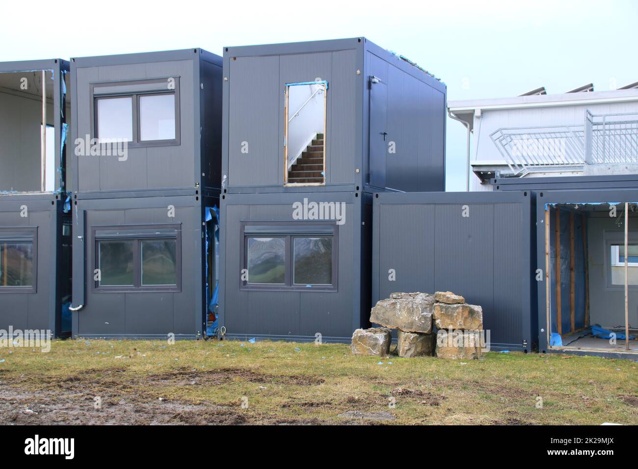 Old containers for living are stored in a storage yard Stock Photo - Alamy