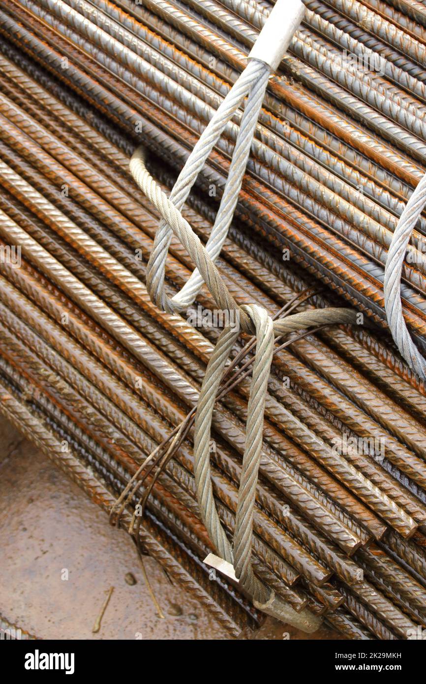 Structural steel was unloaded at a construction site using a metal ...