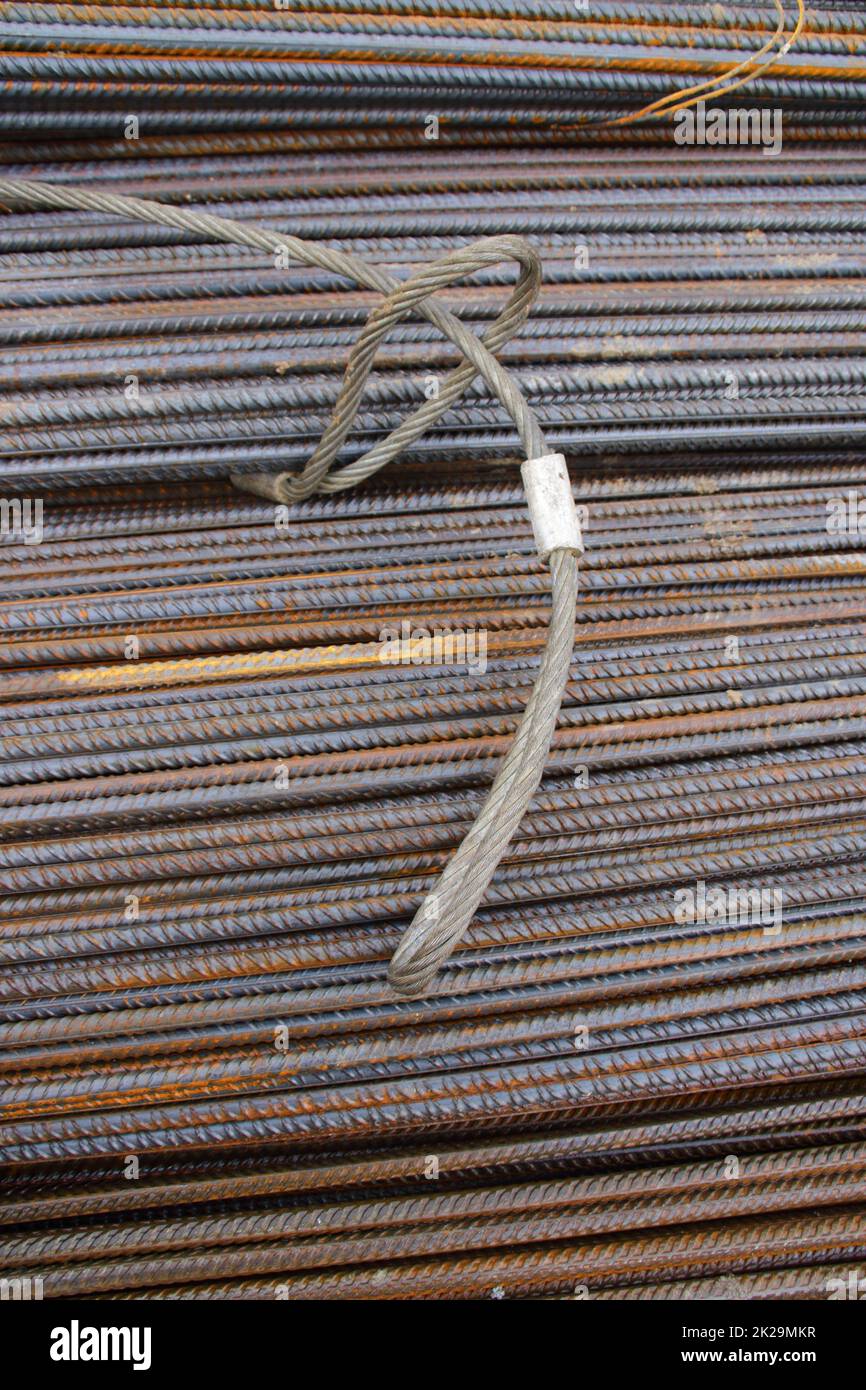 Structural steel was unloaded at a construction site using a metal ...