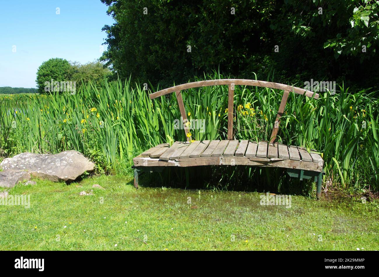 Wooden bench in France, Europe Stock Photo - Alamy