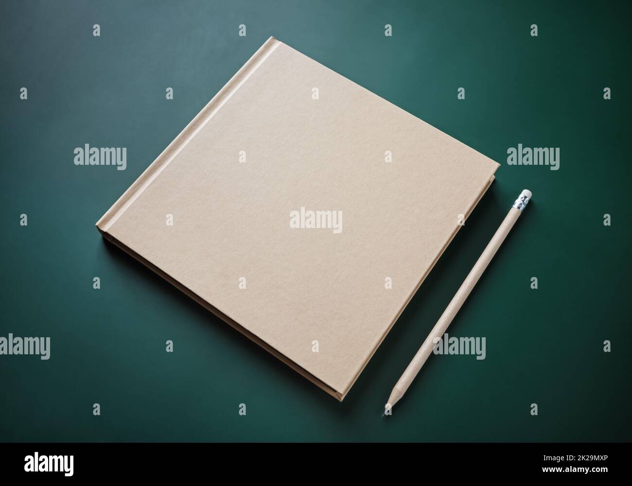 Hardcover book, pencil Stock Photo - Alamy