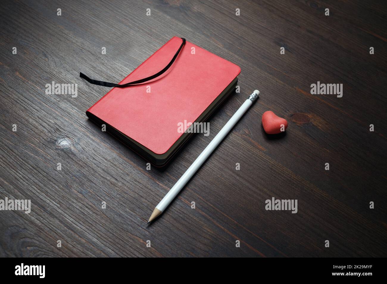 Notepad, pencil, heart Stock Photo - Alamy