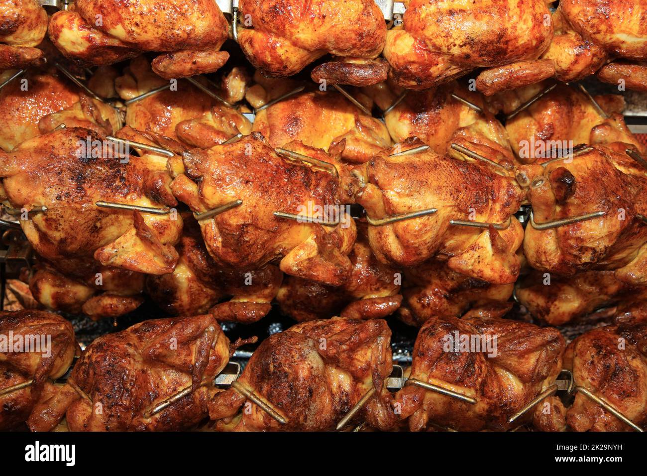 Chickens roasting in Rotisserie in Germany. Europe Stock Photo - Alamy
