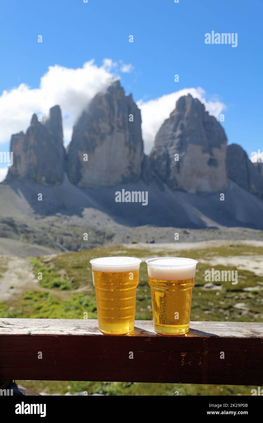 Cups of Beer with the three Peaks of Lavaredo. Dolomites. South Tyrol ...