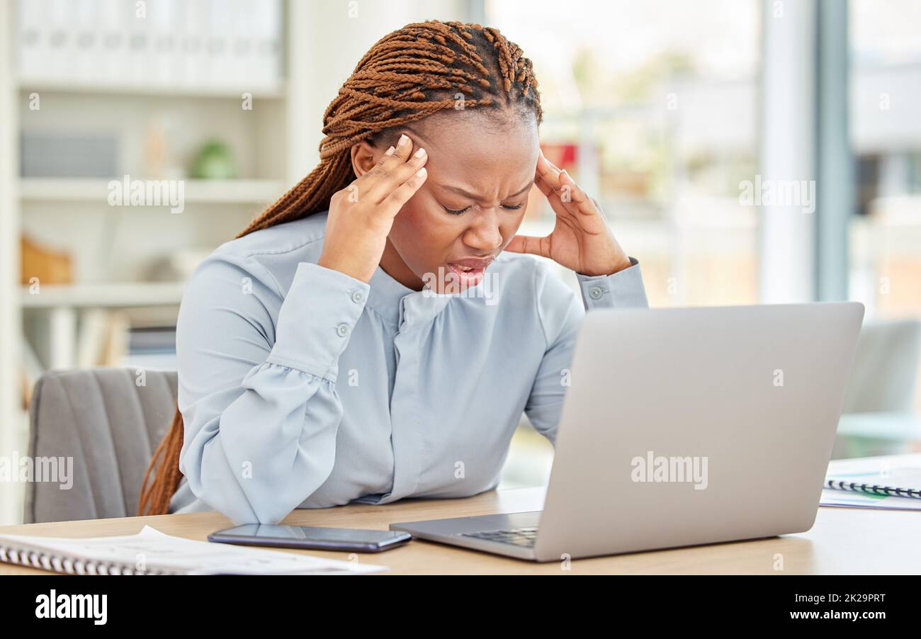 Stress, headache and black woman with laptop in office with confused ...