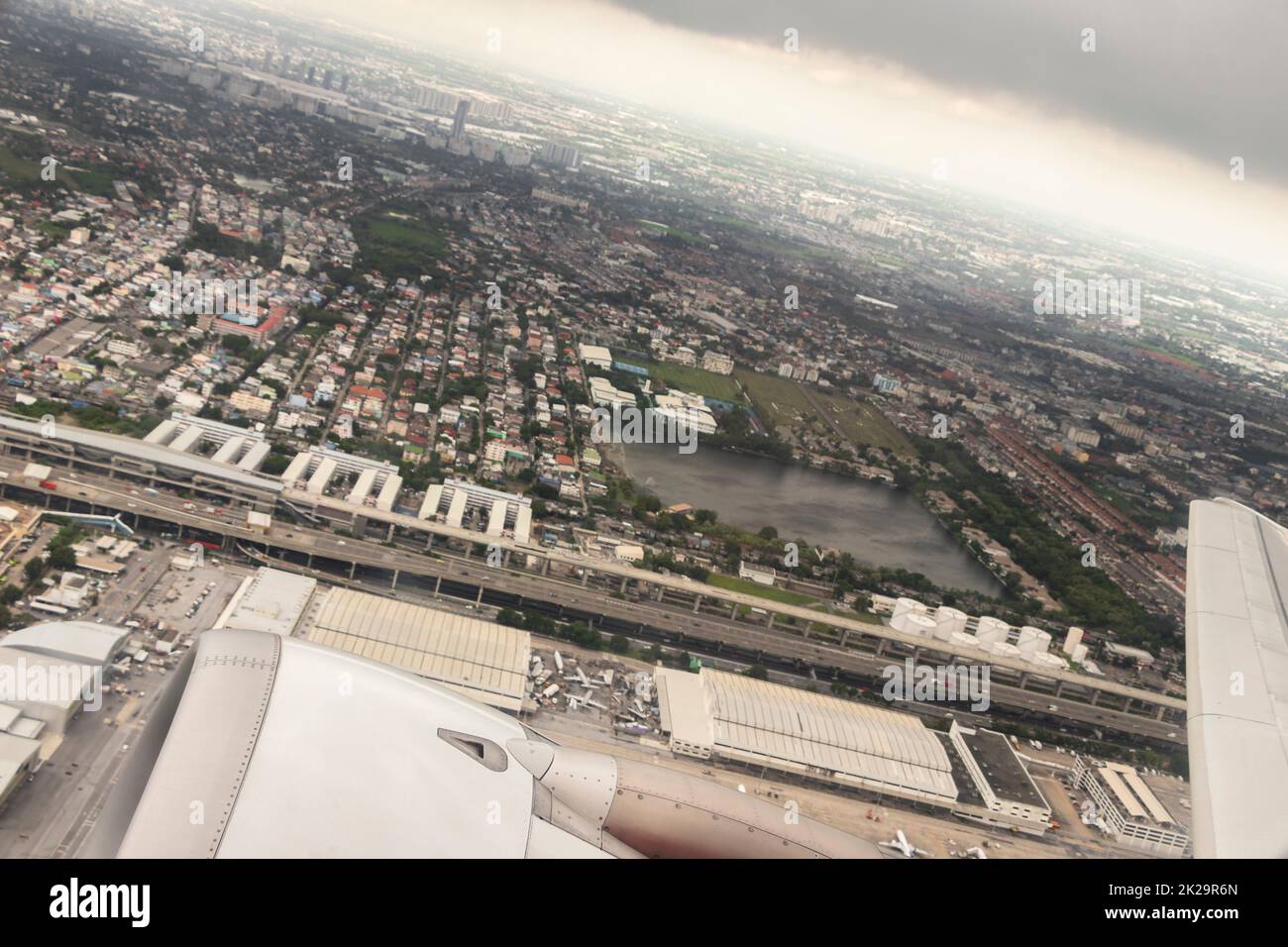 Flight over Bangkok in Thailand, nice city panorama from airplane Stock ...
