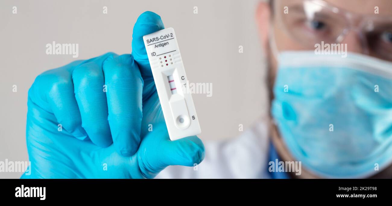 Positive test result by using rapid test device for COVID-19 Stock ...