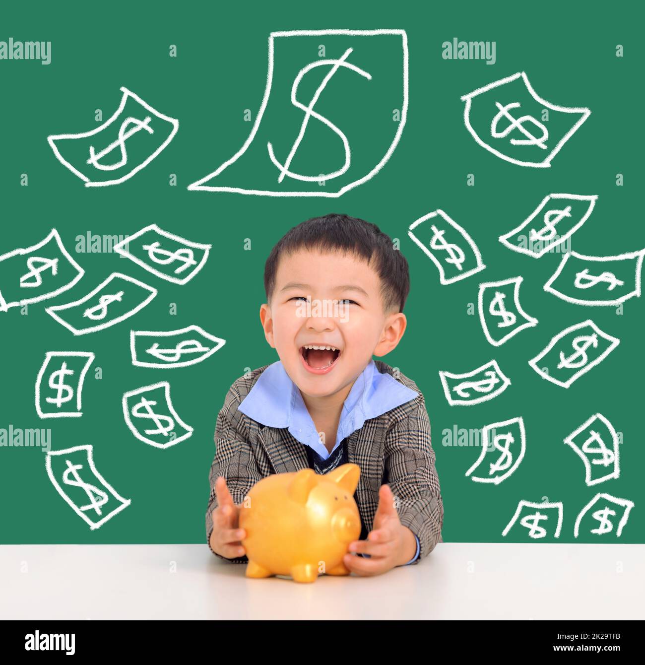 Happy kid holding piggy bank and saving money concept Stock Photo - Alamy