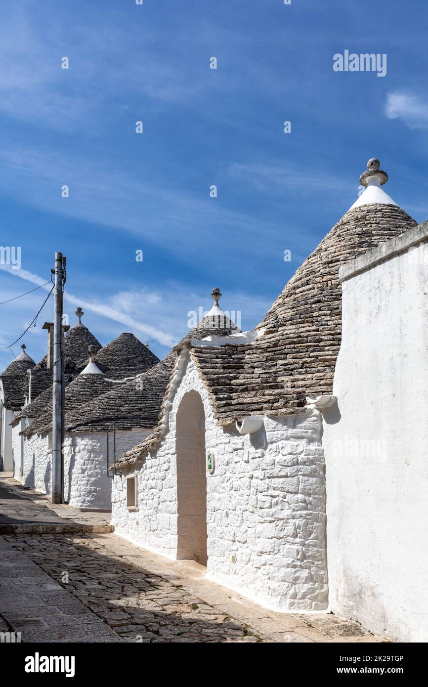 Trulli village in Alberobello, Italy. The style of construction is ...