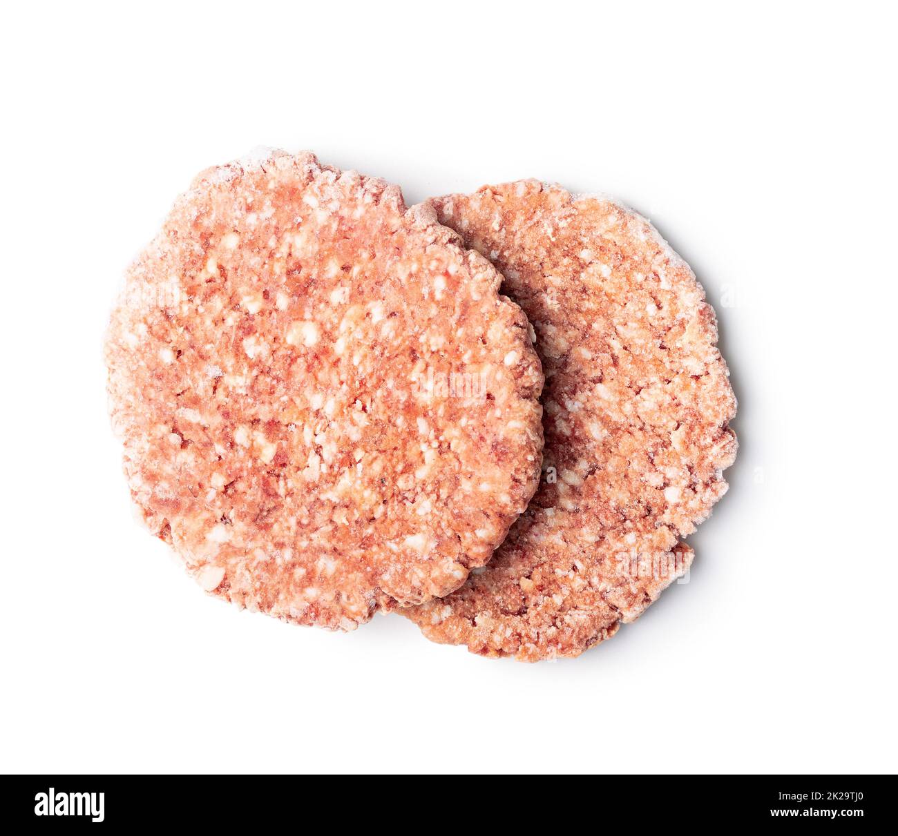 Frozen hamburger meat. Raw beef patties isolated on white background ...