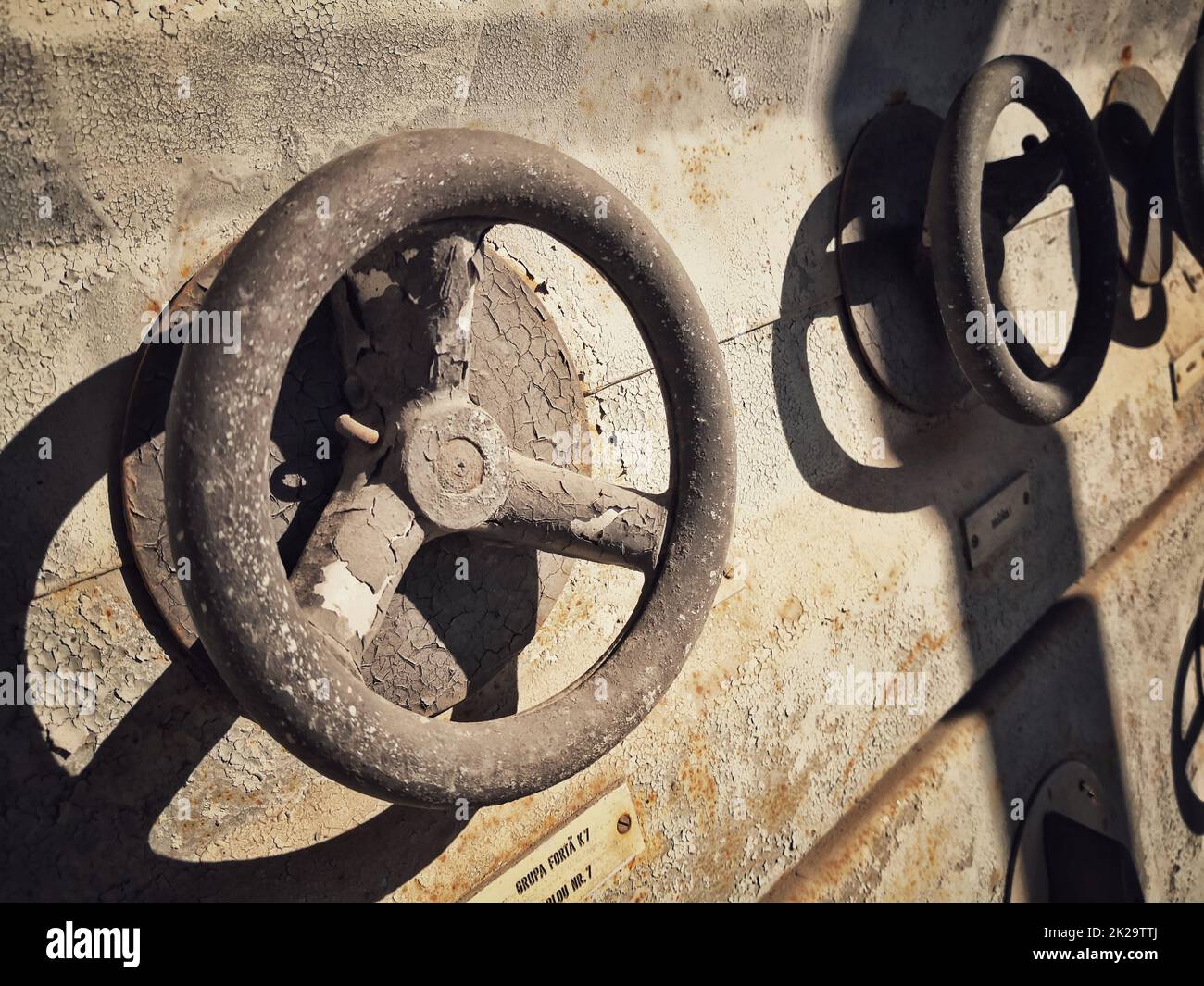 Rusty iron oil pipe valve wheel Stock Photo - Alamy