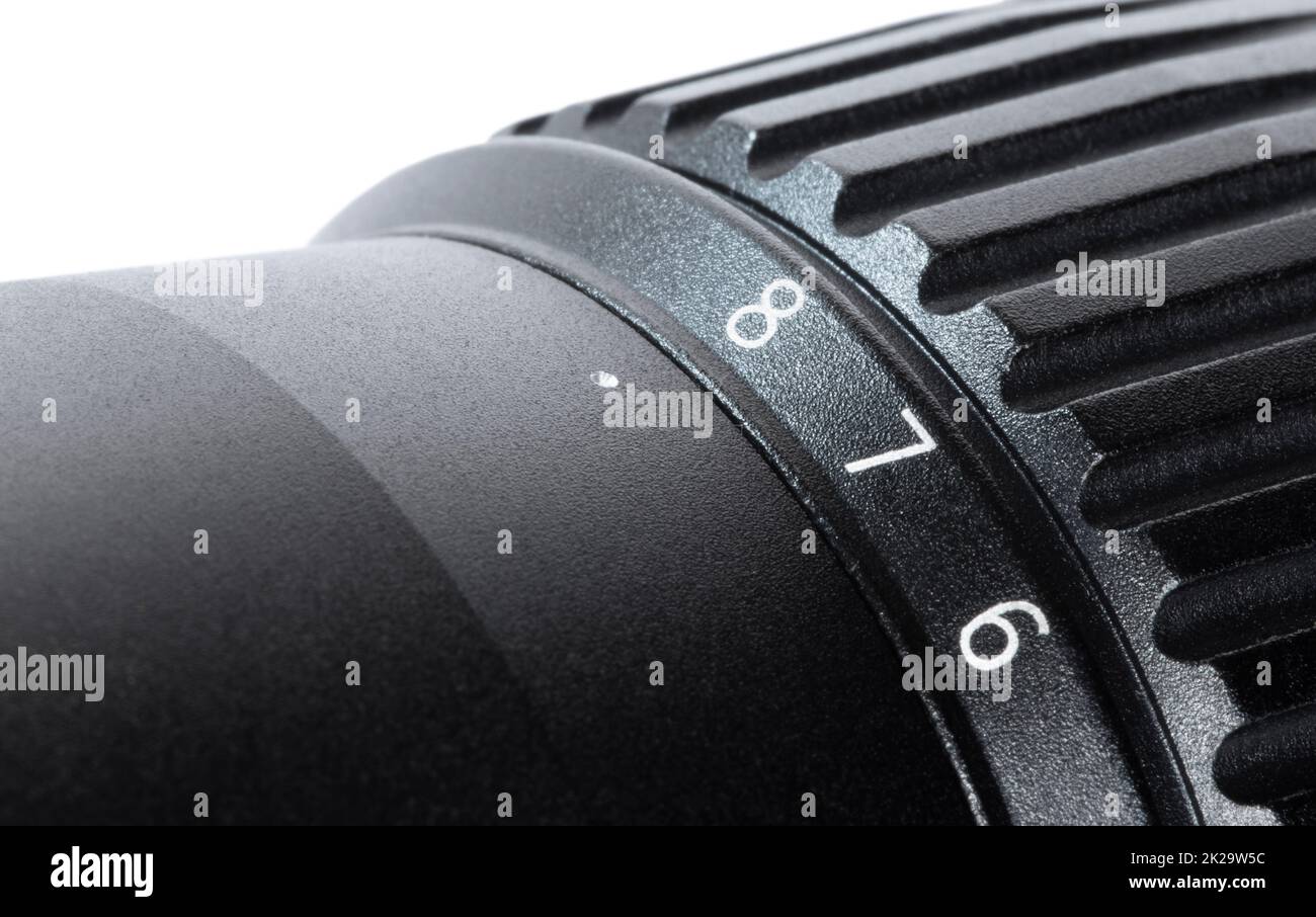 Macro of the magnfication setting on a gun scope isolated on white ...