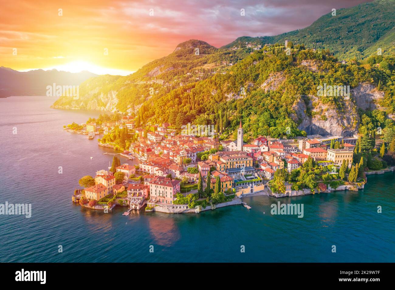 Town of Varenna and Como lake epic sunset aerial view Stock Photo - Alamy
