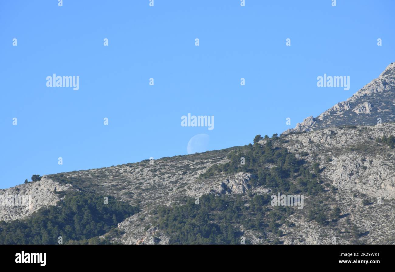 the moon, just before colliding with the mountain, Alicante province ...