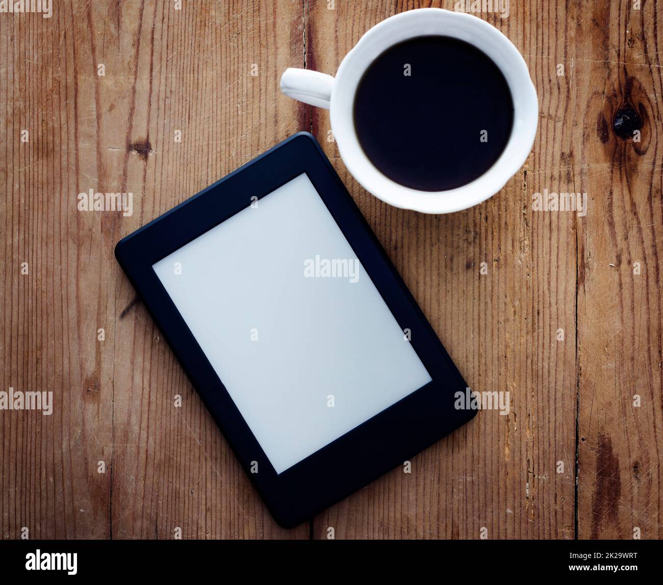 E-book reader and coffee Stock Photo - Alamy