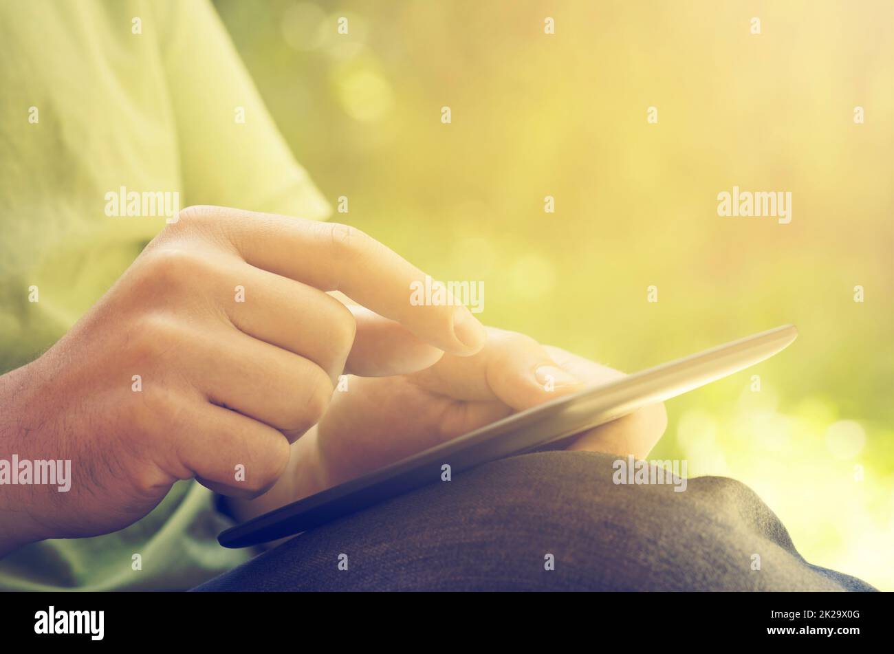 Hand man typing tablet hi-res stock photography and images - Alamy