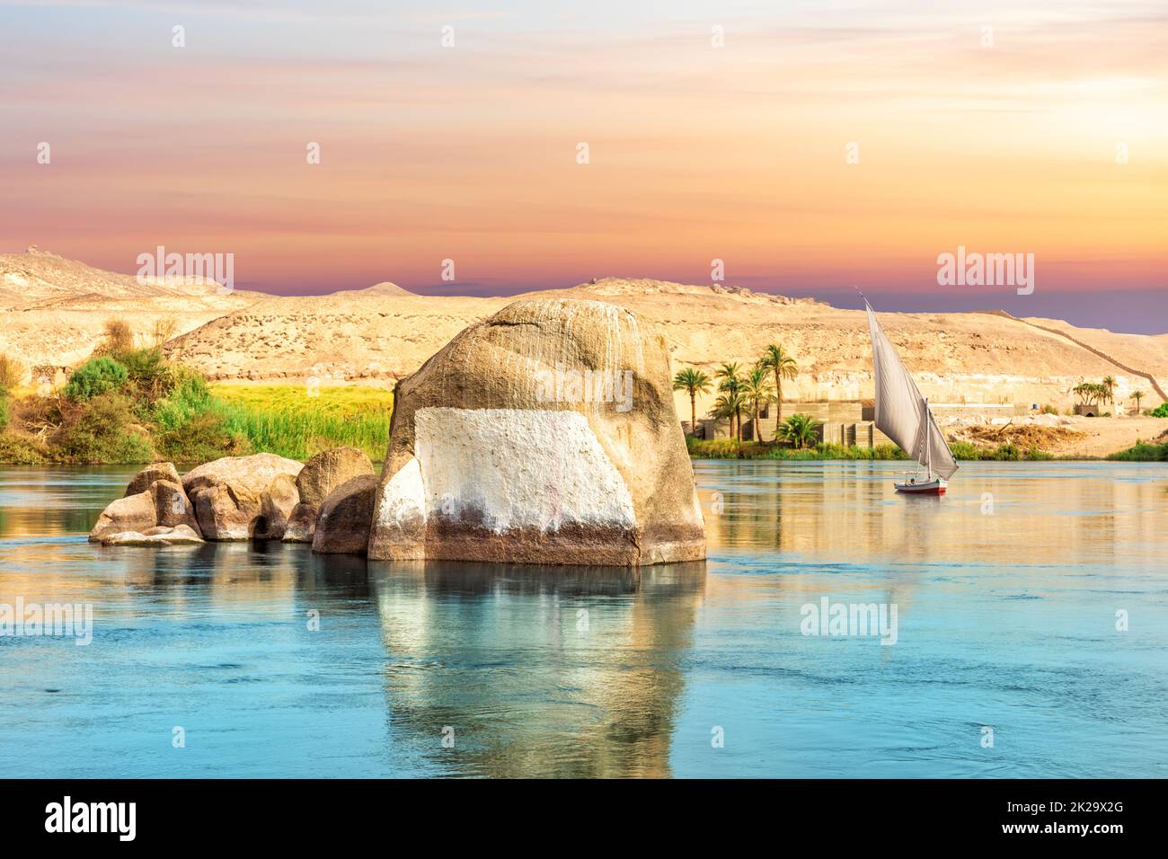 Sailboat in the Nile, sunset scenery, Aswan, Egypt Stock Photo - Alamy