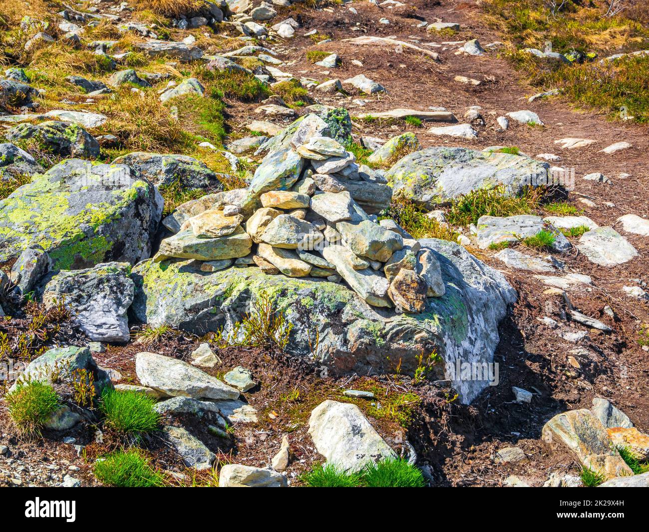 Stacked stones by the Hydnefossen waterfall in Hemsedal, Norway Stock ...