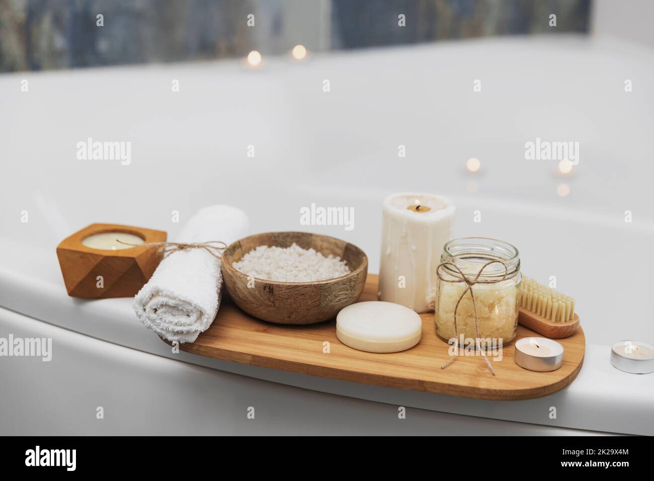 Hotel spa treatment or home bath procedure. Bathroom with accessories ...