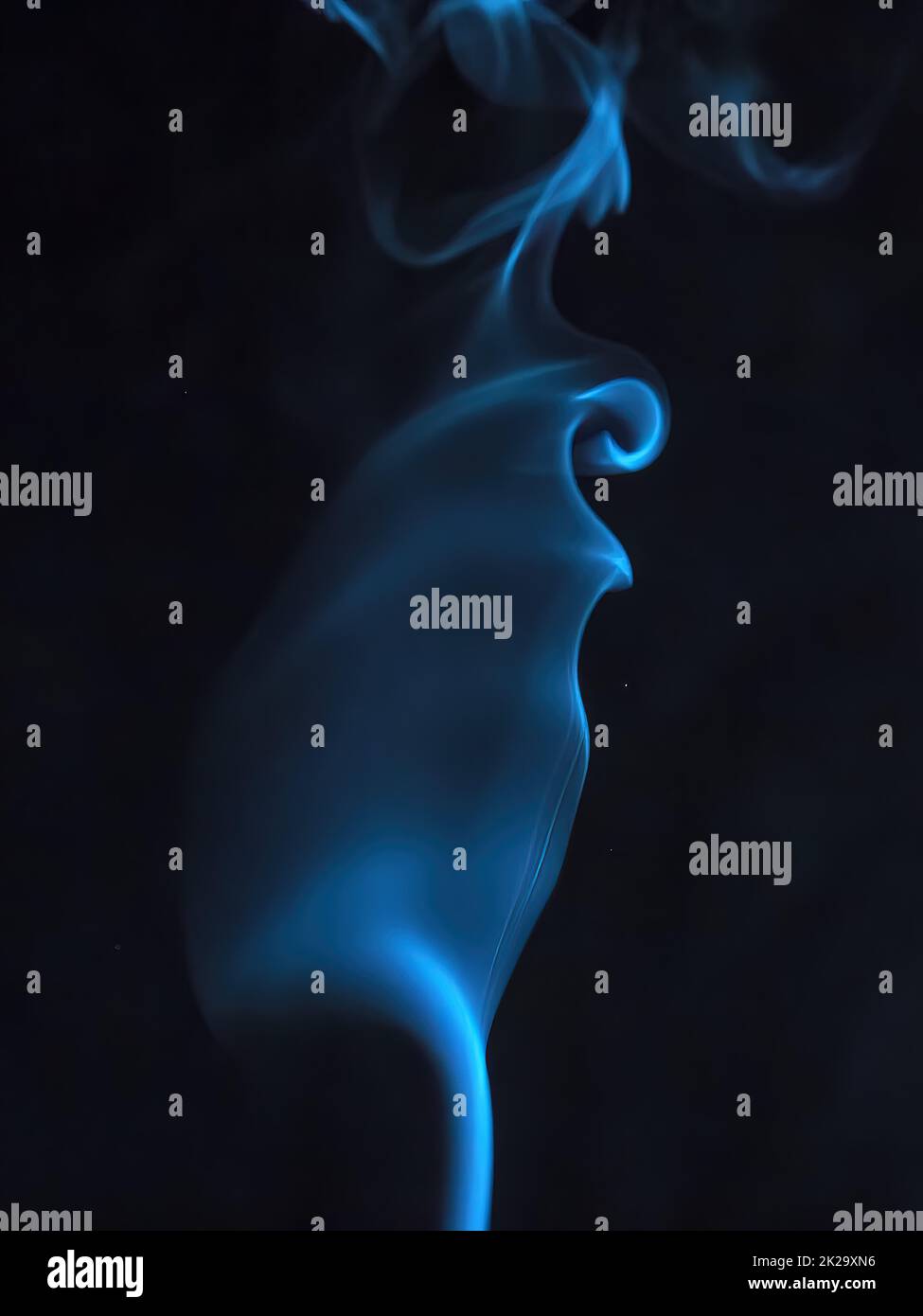 Close up movement of colorful smoke isolated on black background ...