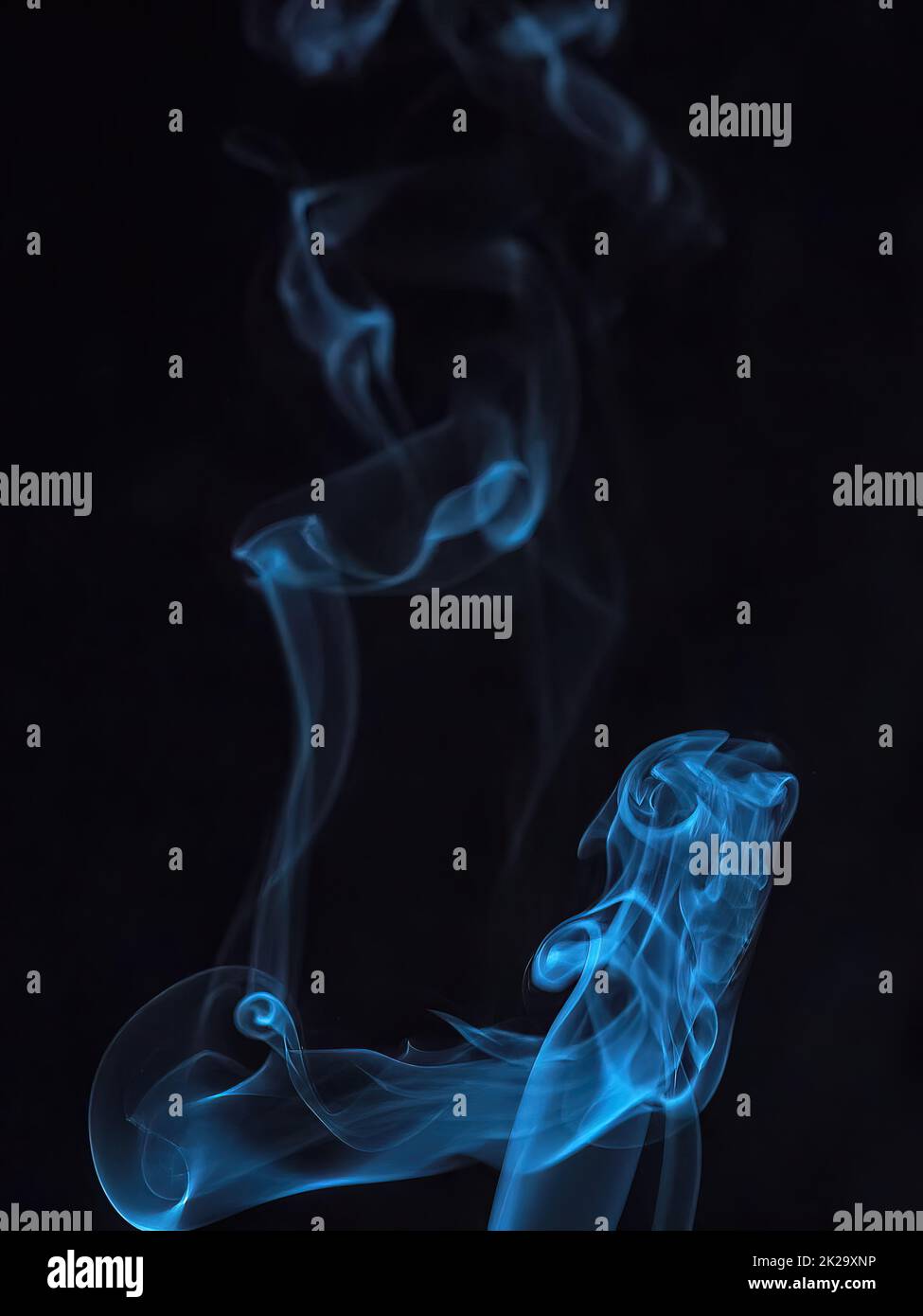 Close up movement of colorful smoke isolated on black background ...