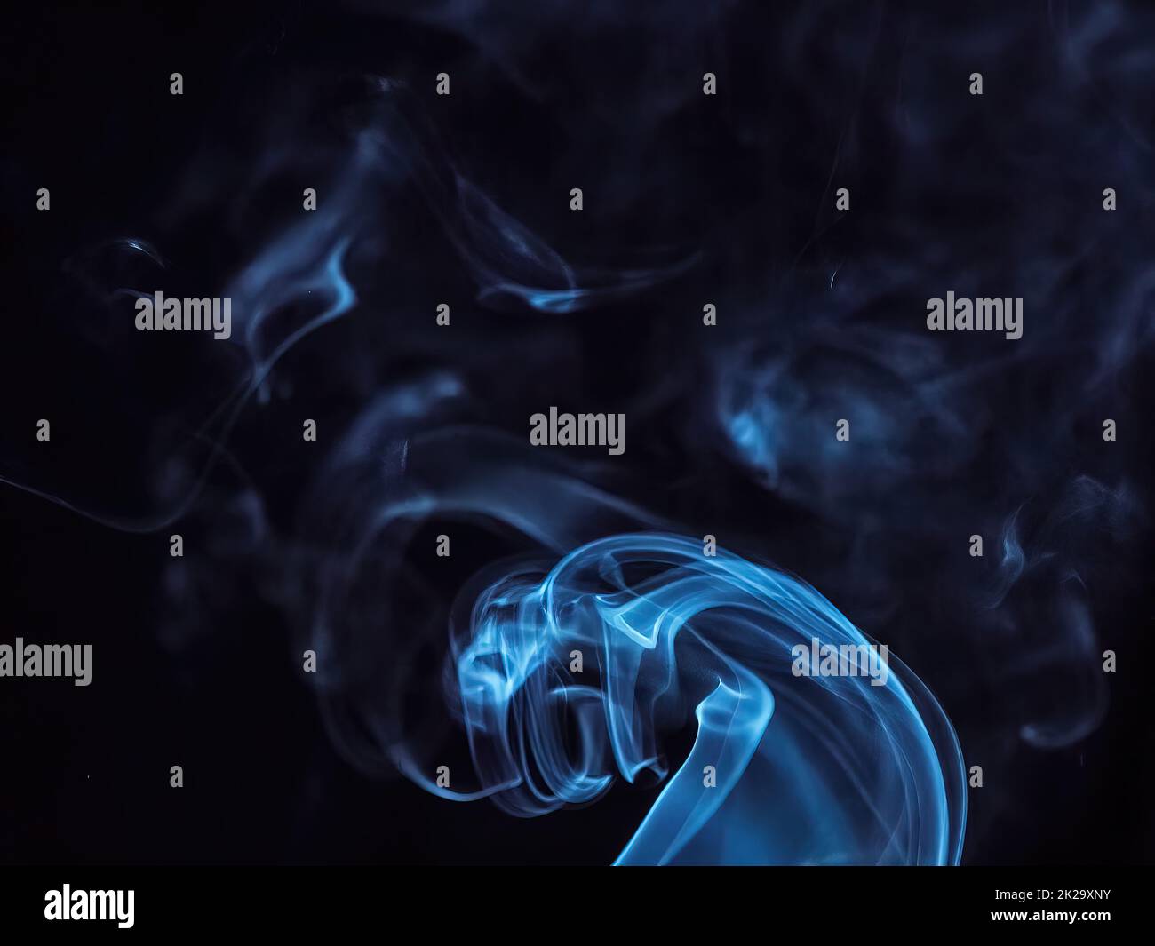 Close up movement of colorful smoke isolated on black background ...