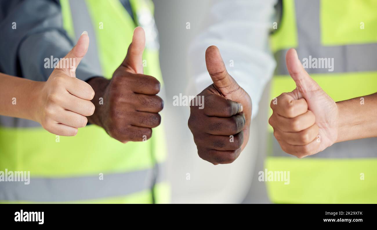 Thumbs up, hands and construction worker diversity in success, trust ...