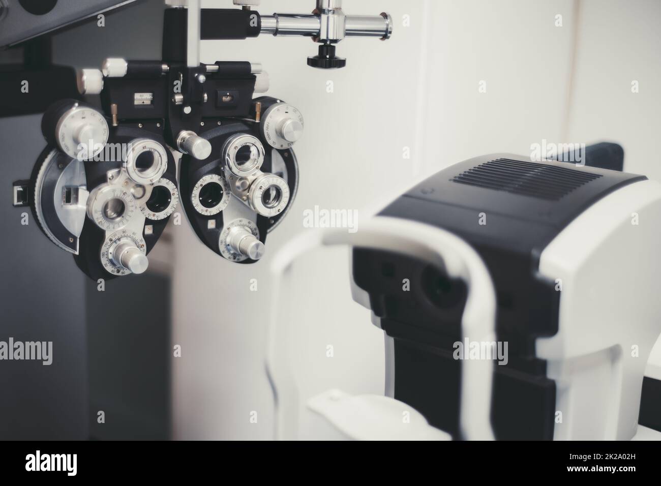 A close-up view of a phoropter, an ophthalmic testing device for ...