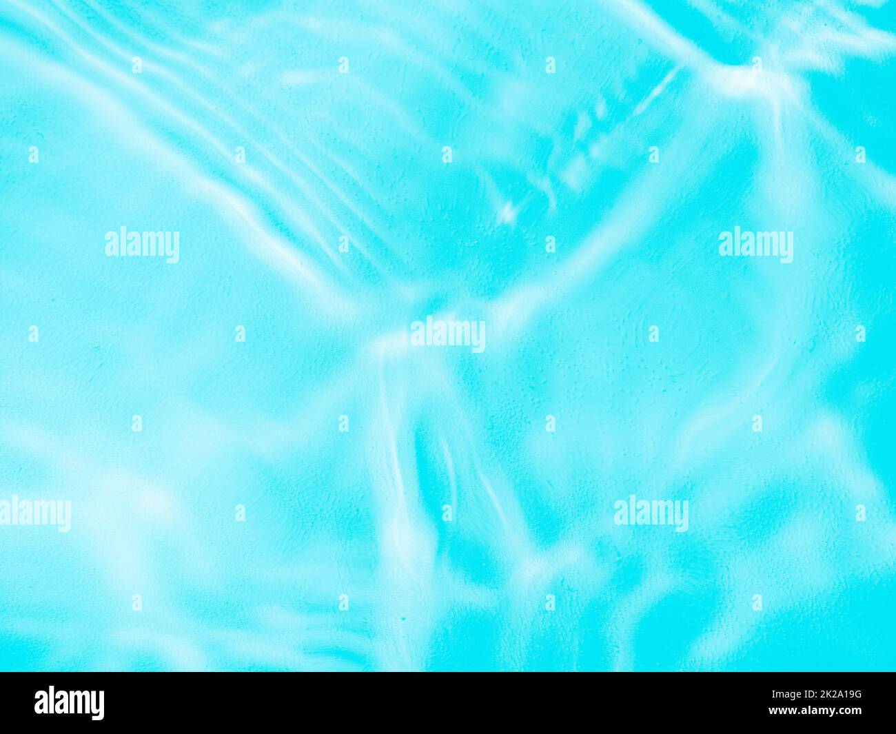 Ripple water texture with shadows on blue Stock Photo - Alamy