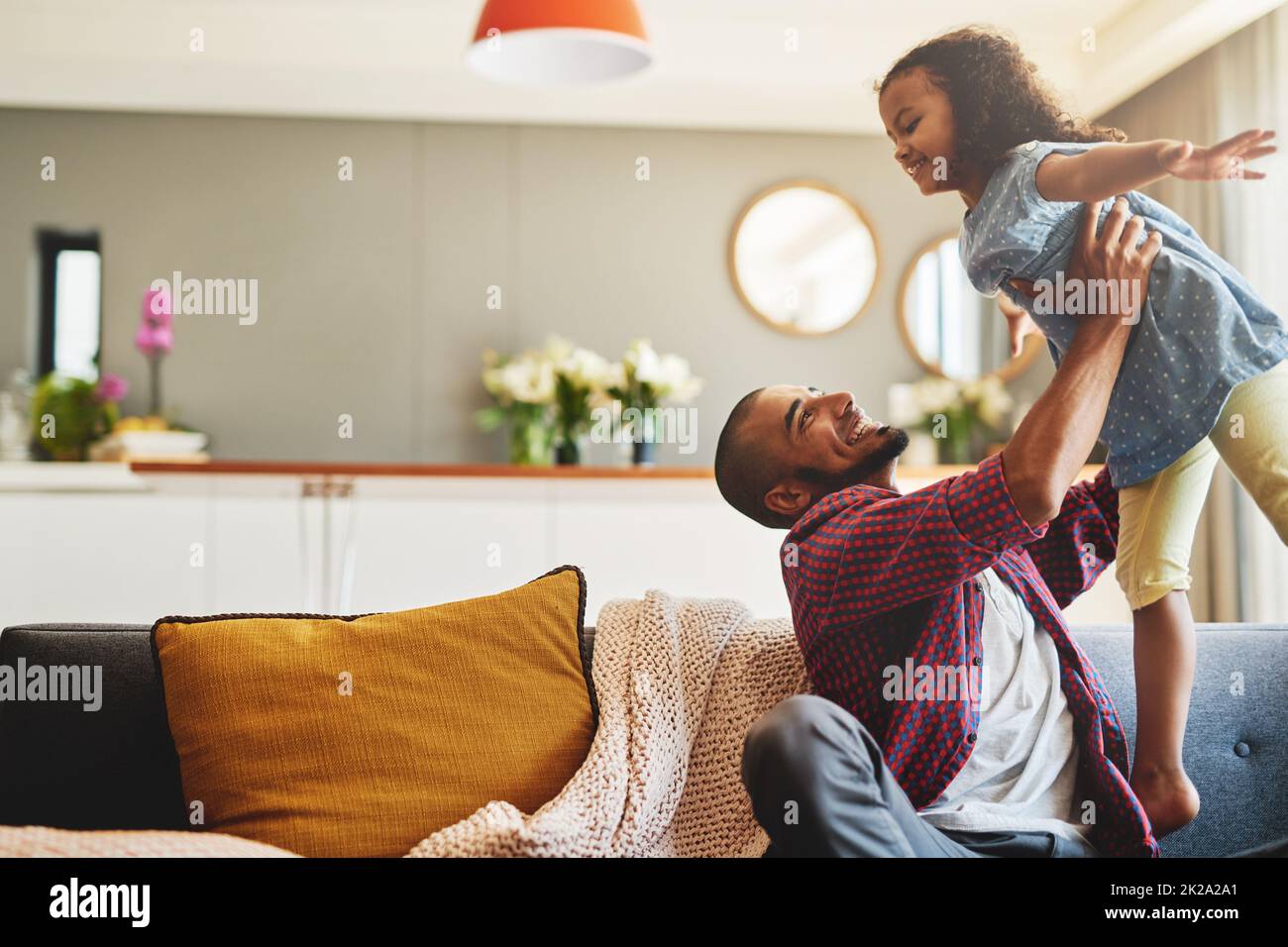 Man lifting kids hi-res stock photography and images - Alamy