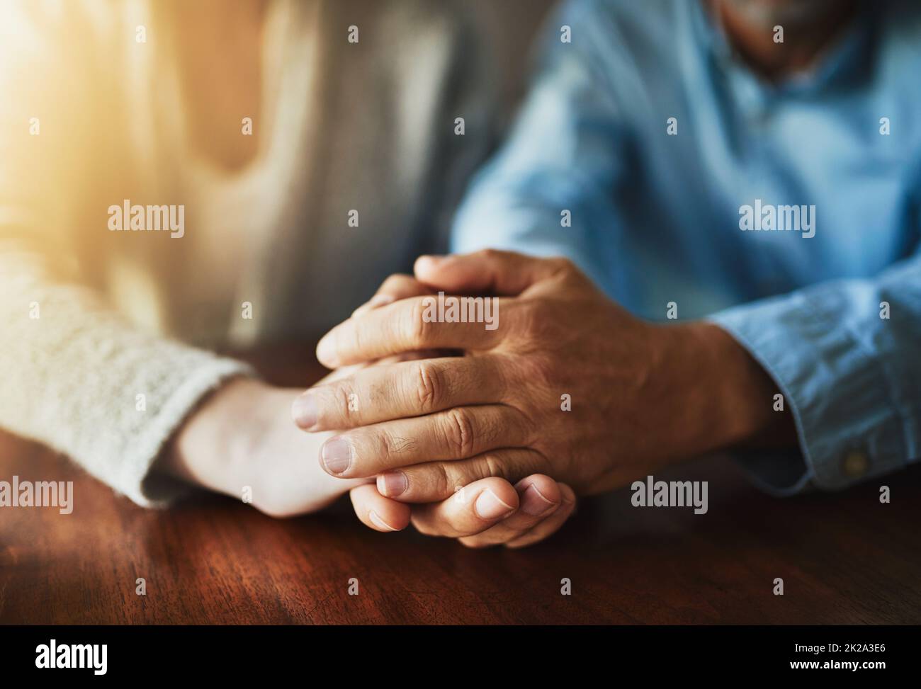 Caring in hands hi-res stock photography and images - Alamy