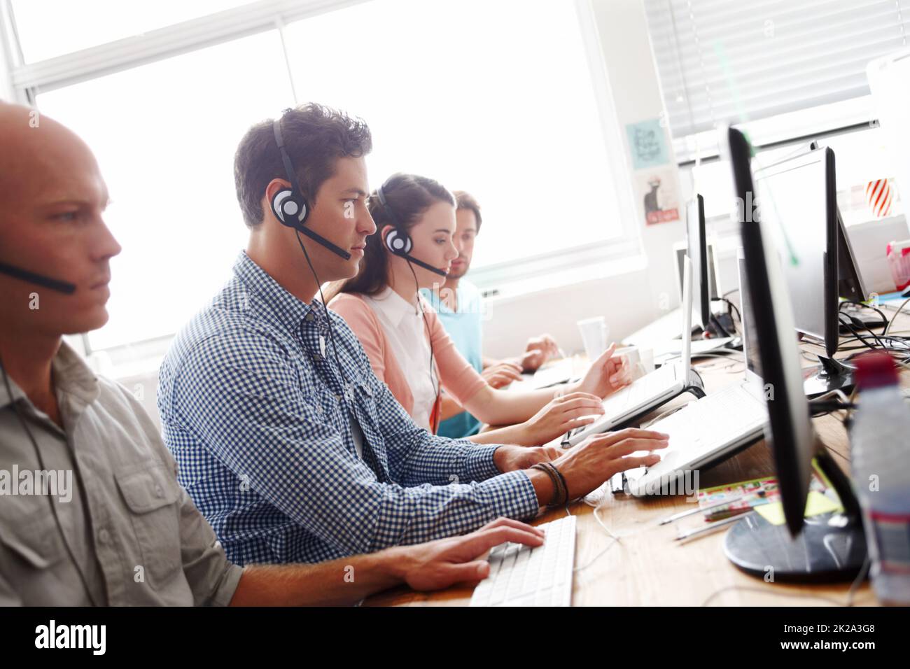 Working computers hi-res stock photography and images - Alamy