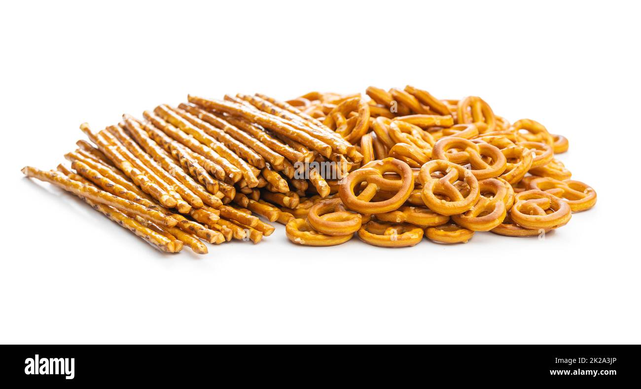Mini pretzels and salted sticks. Crusty salted snack isolated on white ...