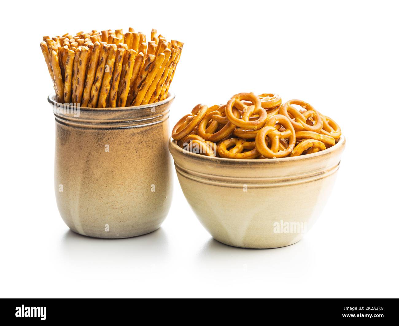 Mini pretzels and salted sticks. Crusty salted snack isolated on white ...
