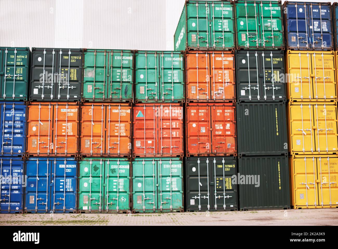 Stacked cargo shipping containers hi-res stock photography and images ...