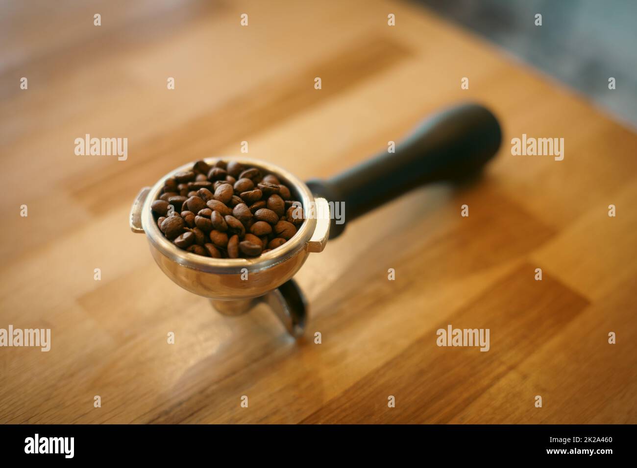 Fresh roasted coffee beans in an espresso filter Stock Photo - Alamy