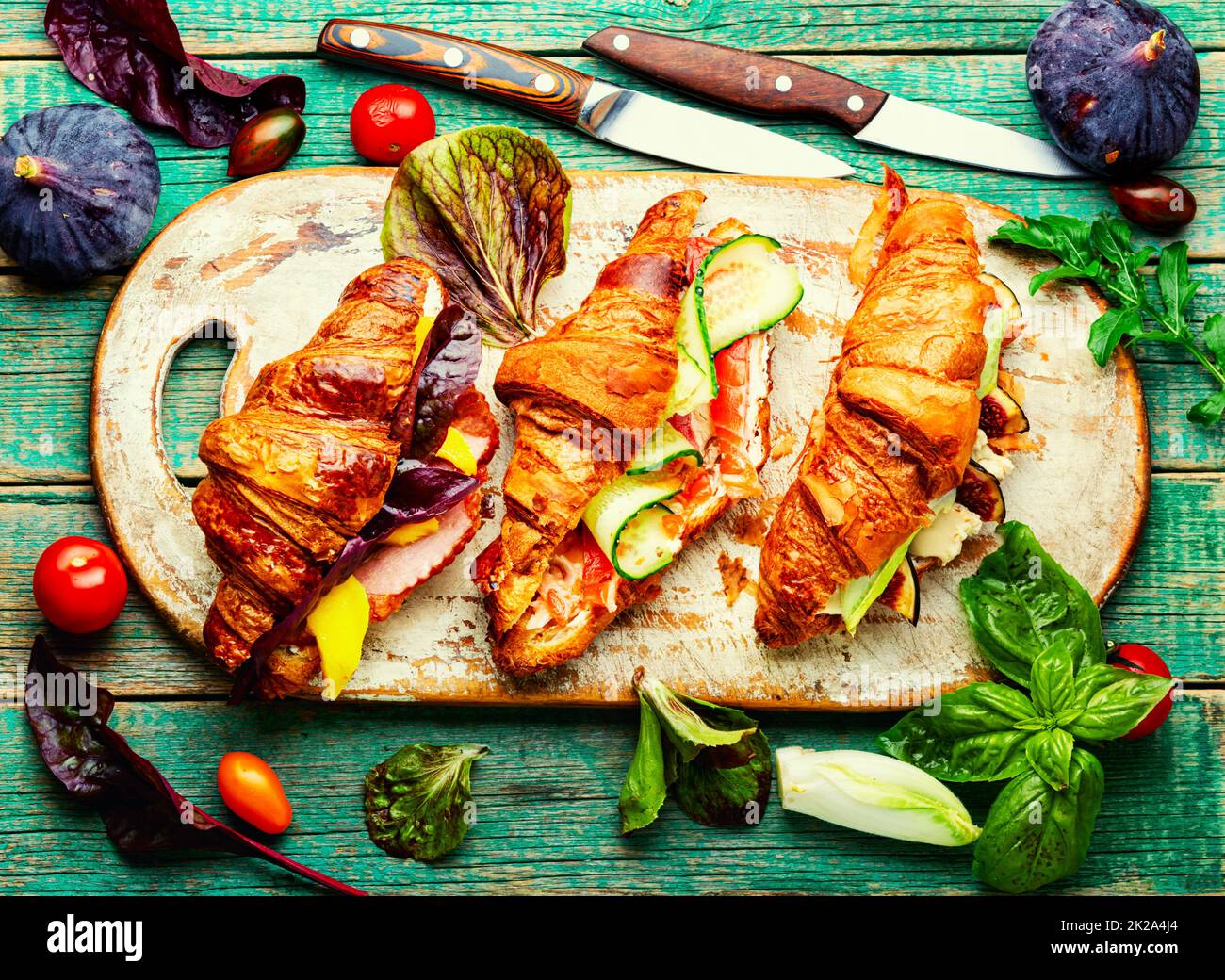 Fresh croissant with meat and fish Stock Photo - Alamy