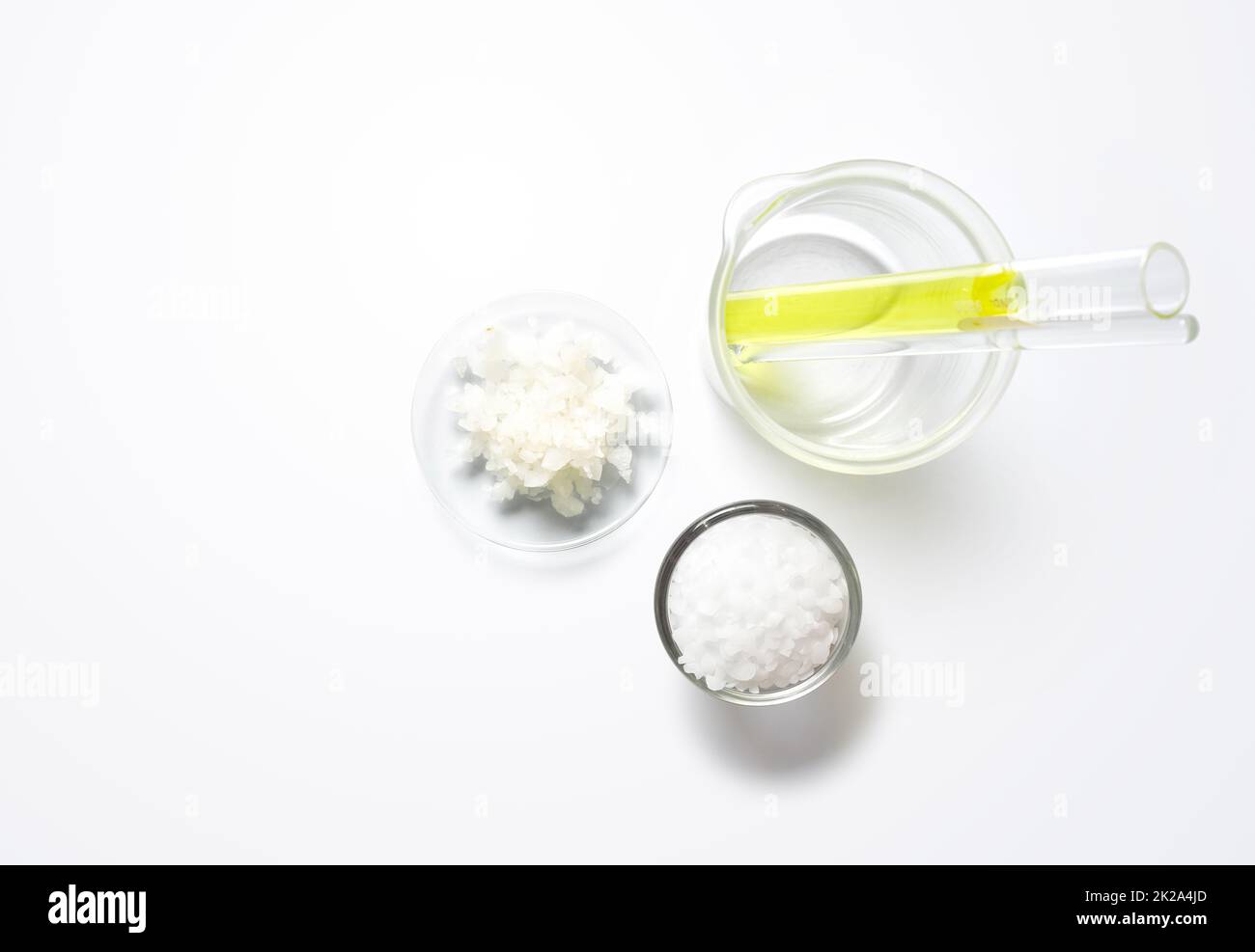 Nickle chloride liquid in test tube, Flake salt in Chemical Watch Glass ...