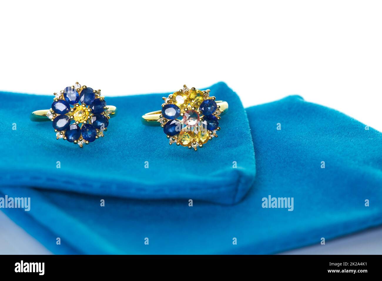 Blue and yellow sapphire Jewel or gems ring on velvet bag. Collection ...