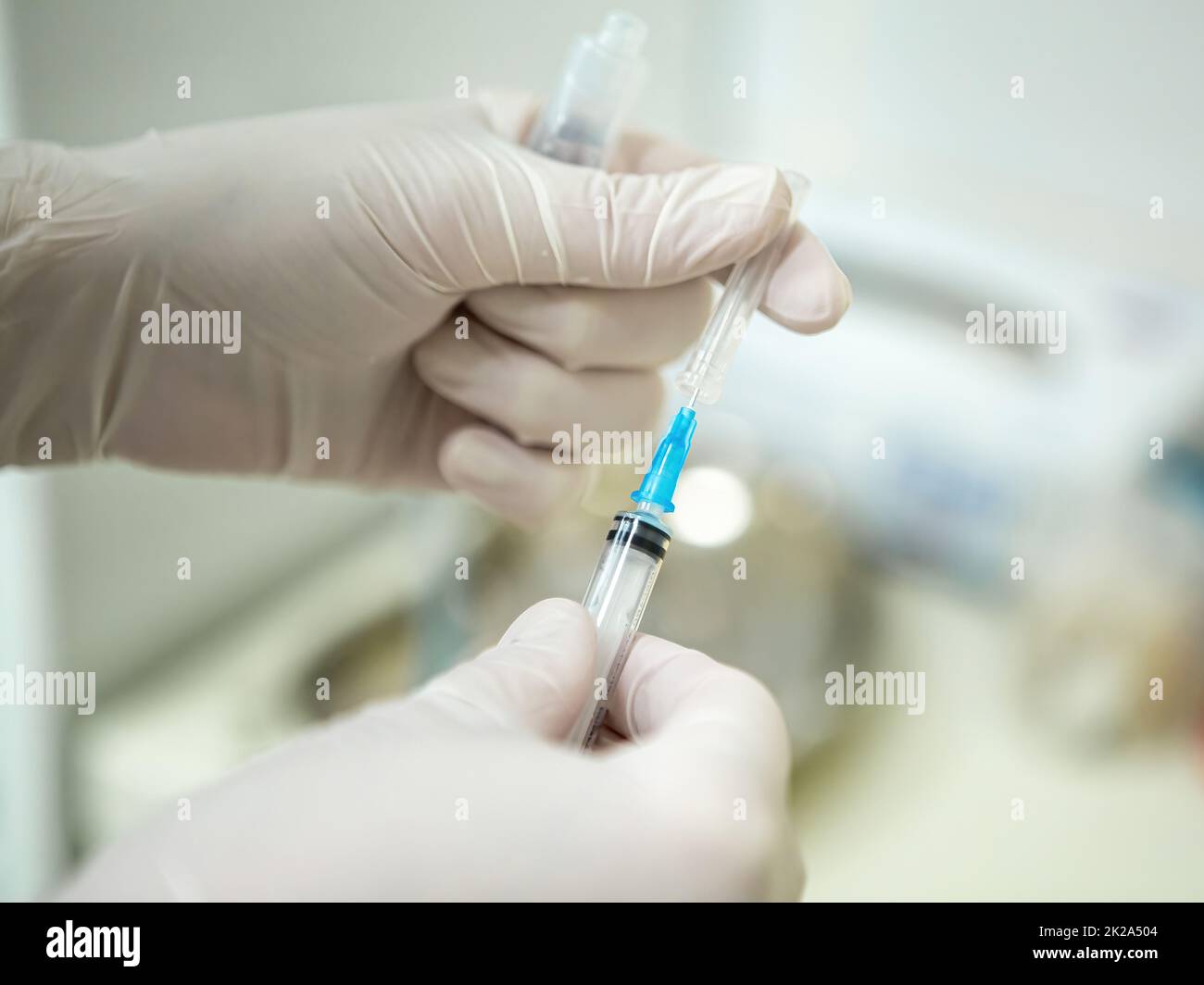 Infusion syringe in hands hi-res stock photography and images - Alamy