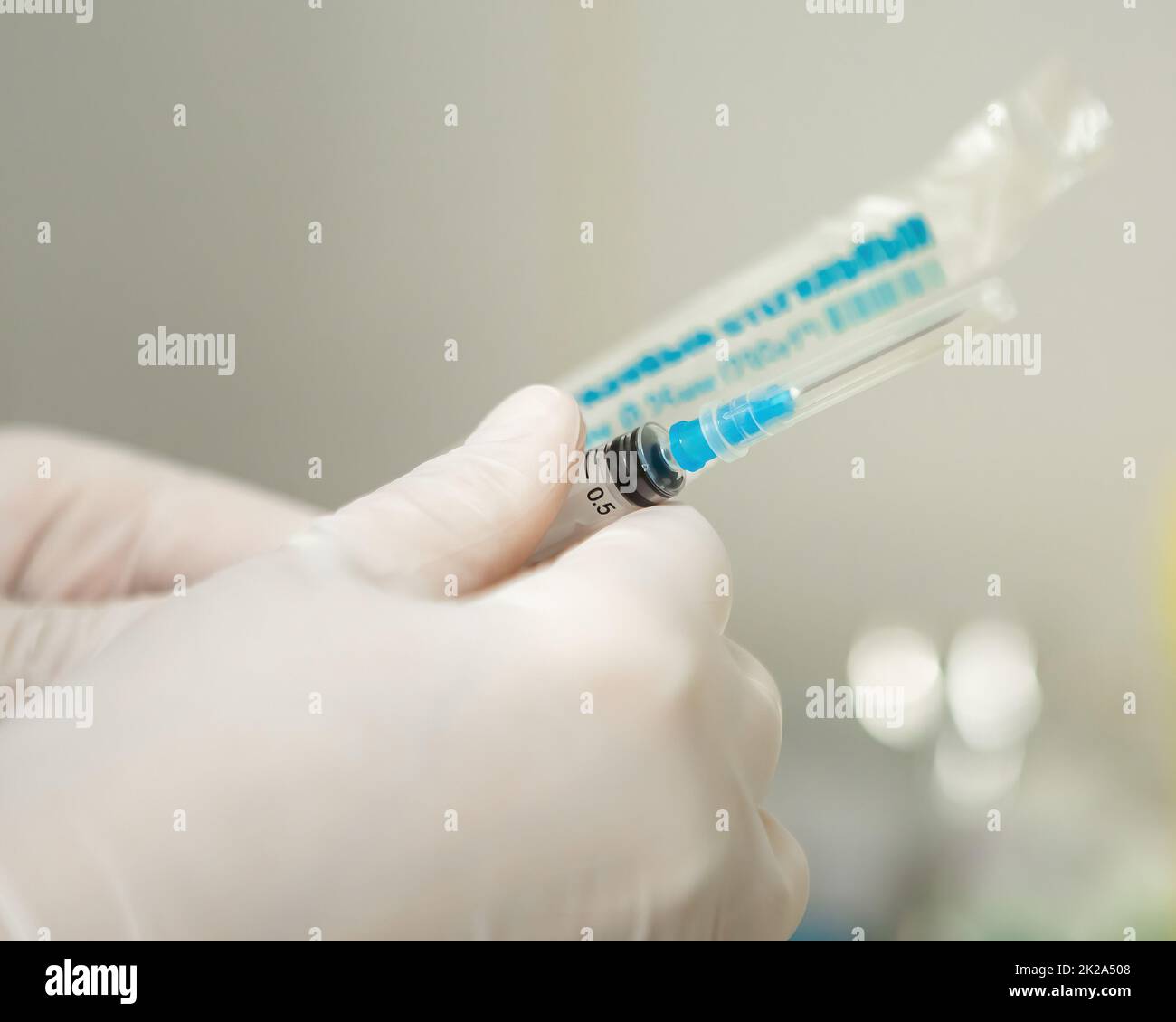 Infusion syringe in the hands of a nurse. Selective focus Stock Photo ...