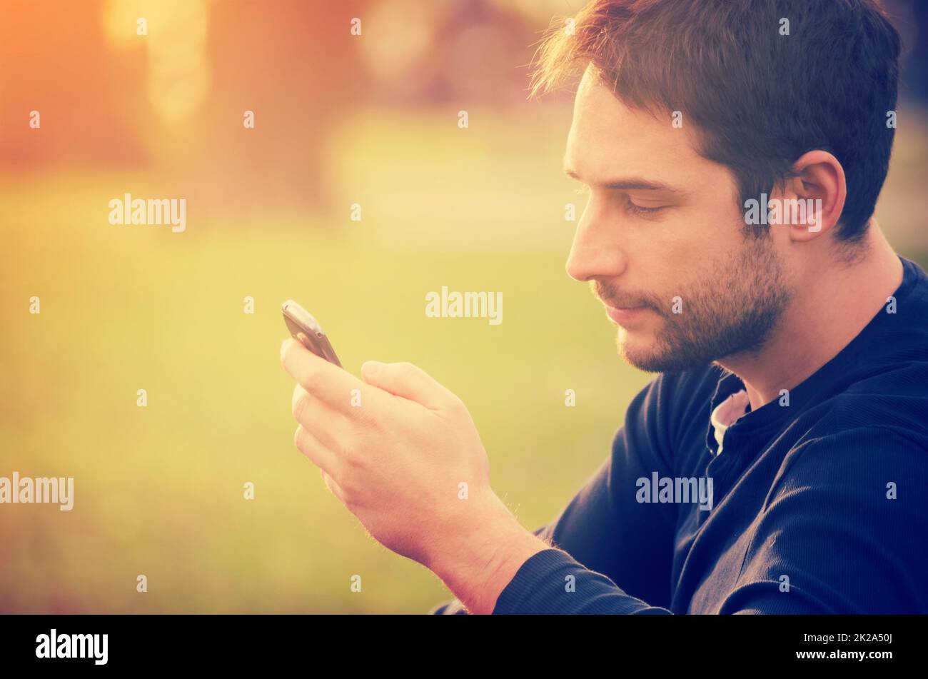 Man with smart phone Stock Photo - Alamy
