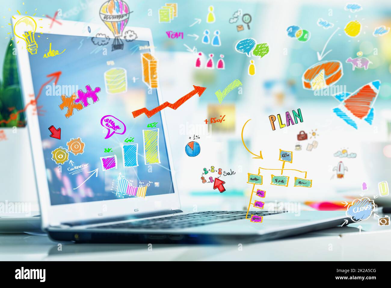 Laptop with sketches of a startup creative projects Stock Photo - Alamy
