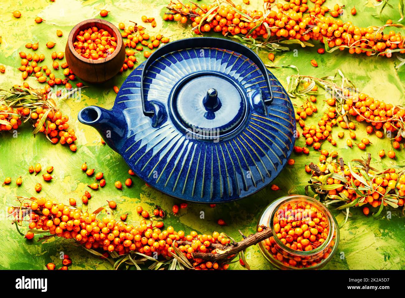 Seasonal medicinal sea buckthorn tea Stock Photo - Alamy