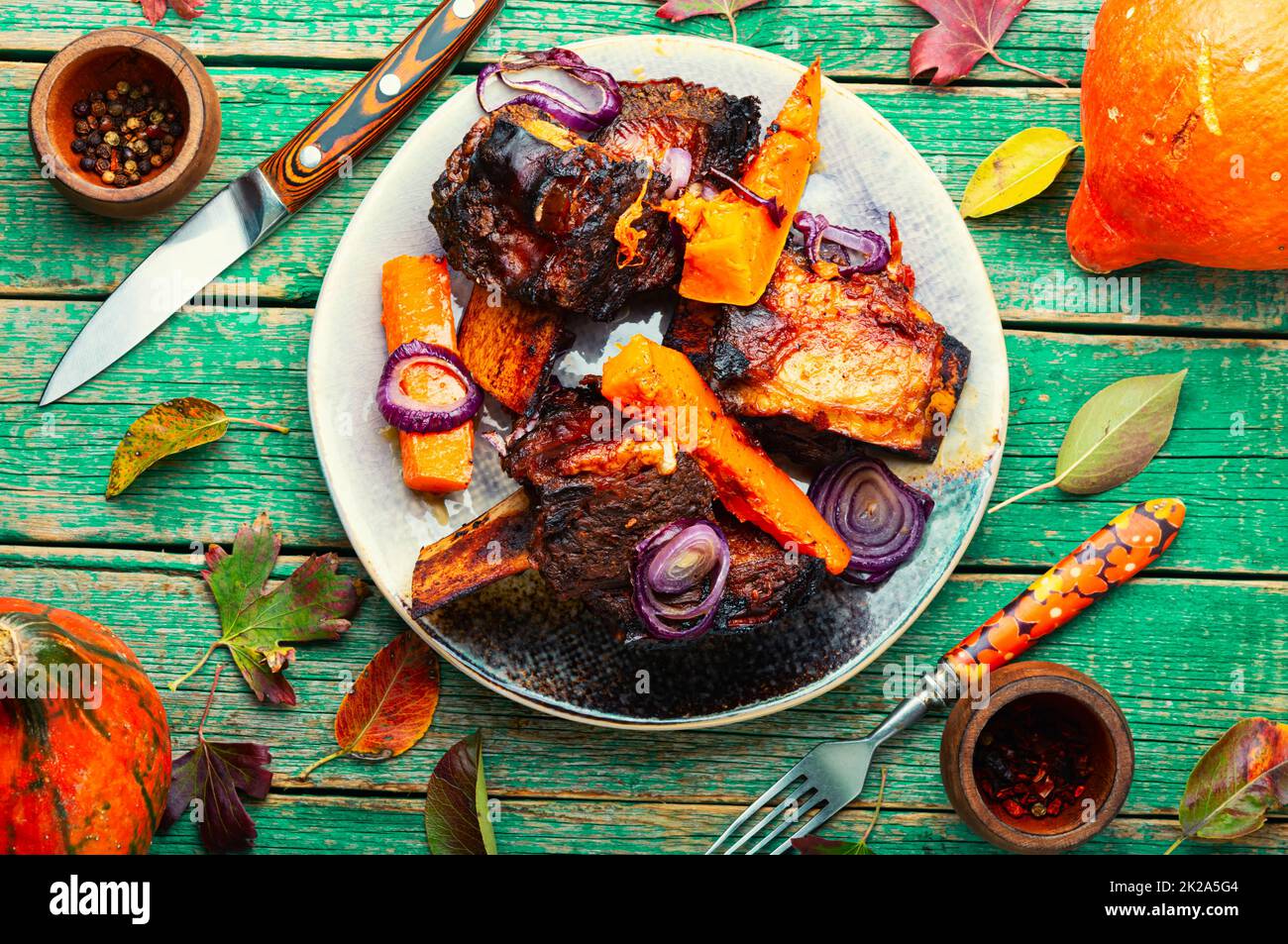 Grilled meat with pumpkin,top view Stock Photo - Alamy