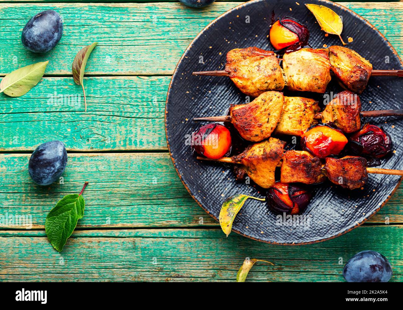 Kebab roasted with plum Stock Photo - Alamy