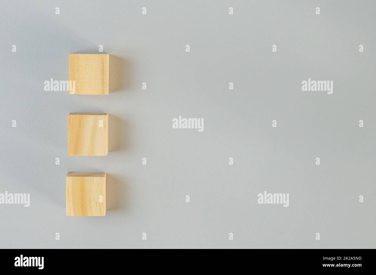 Blank wooden cubes for icons or symbols on gray background Stock Photo ...