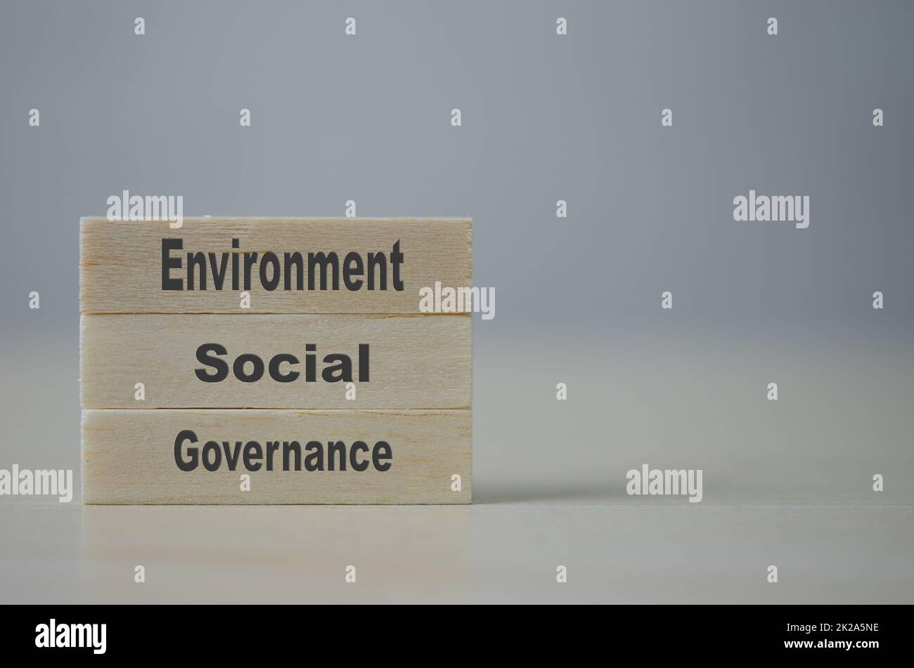 Wooden blocks with words ESG Environmental Social Governance on ...
