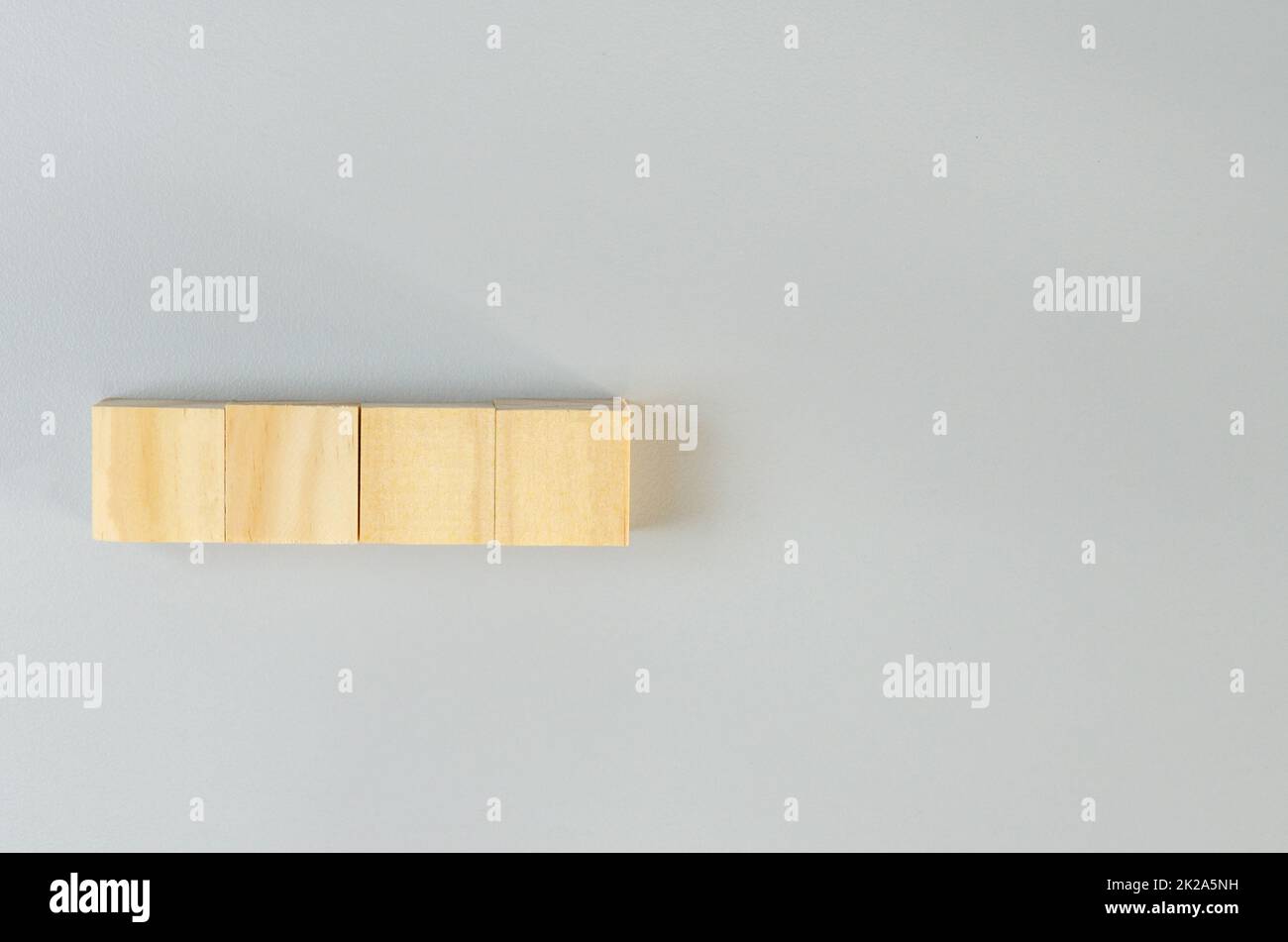Blank wooden cubes for icons or symbols on gray background Stock Photo ...