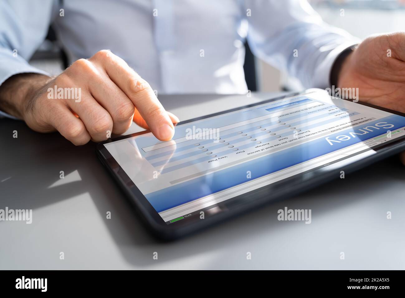 Filling Online Survey Form Or Questionnaire Poll Stock Photo - Alamy